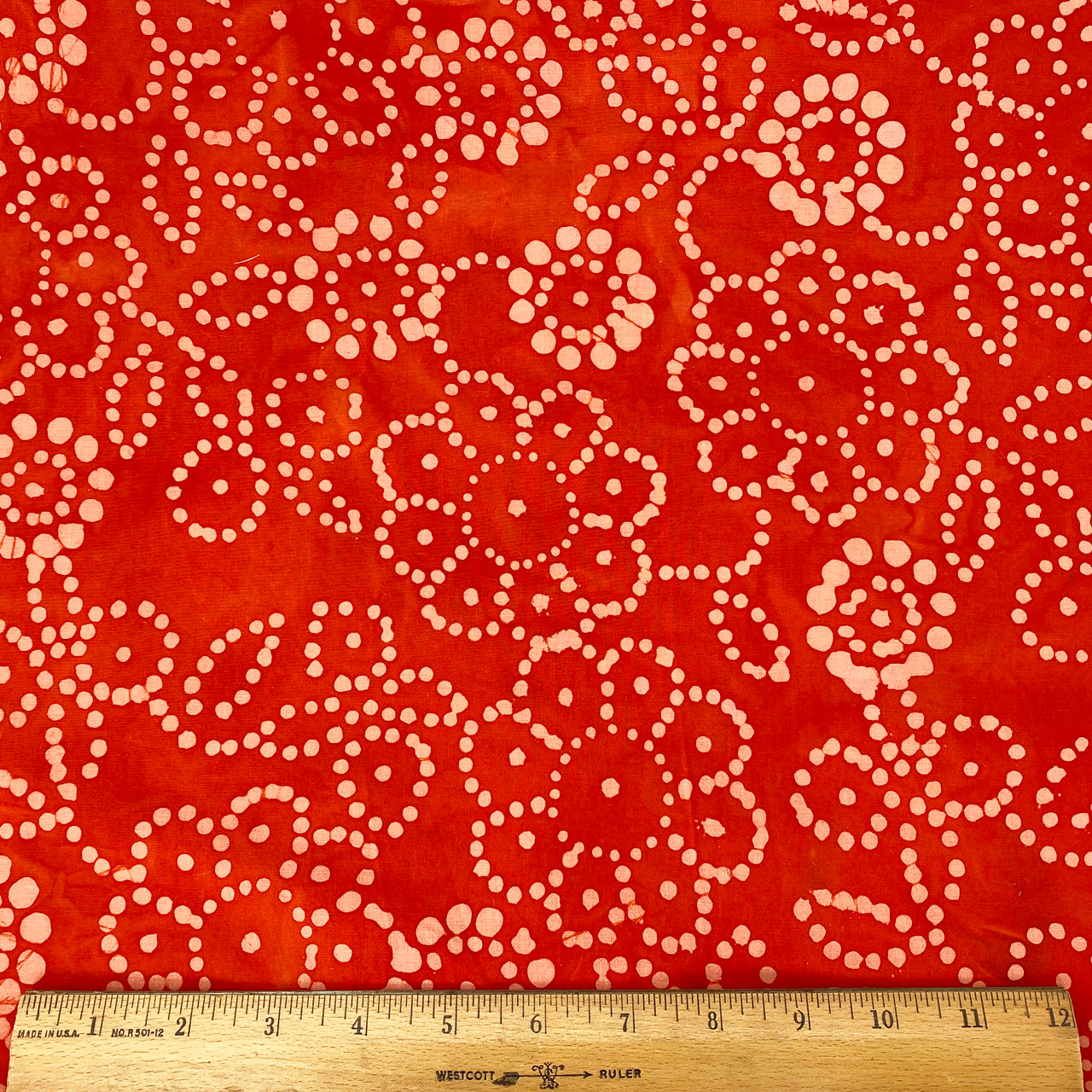 red patterned cotton fabric